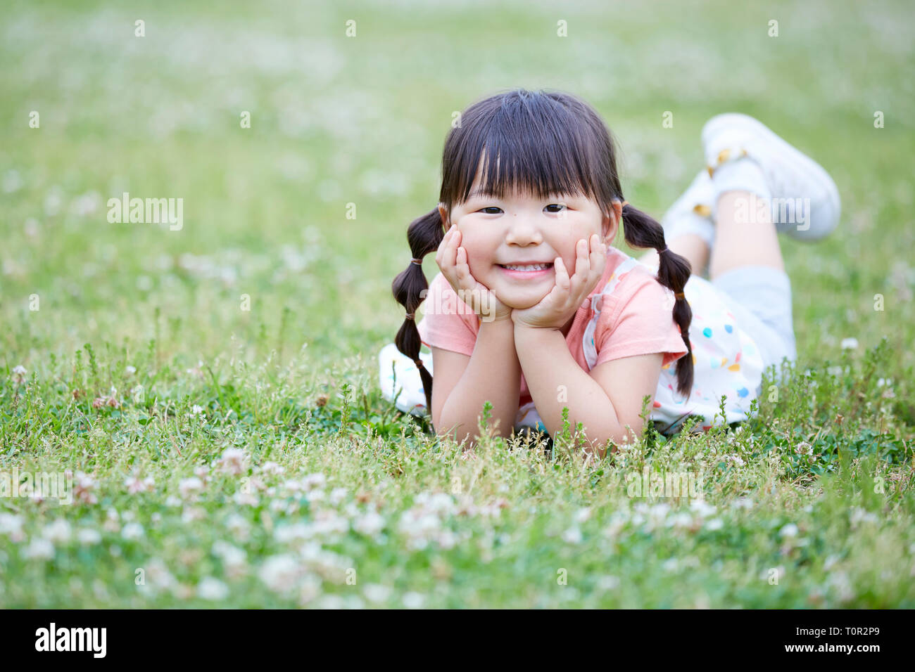 Japanese kid at a city park Stock Photo - Alamy