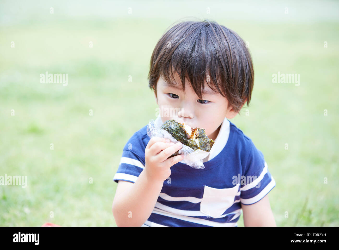 Japanese kid at a city park Stock Photo - Alamy
