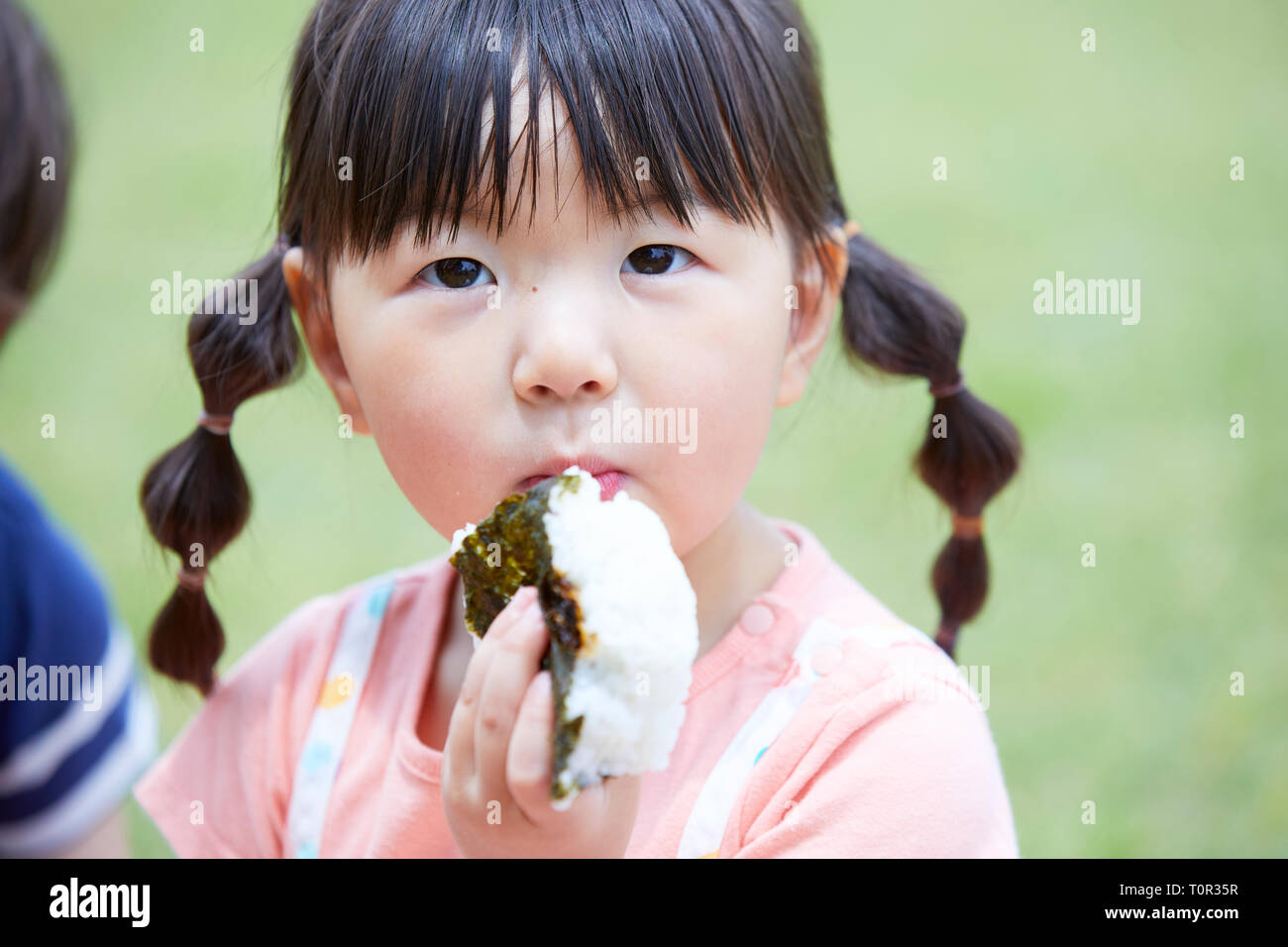 Japanese kid at a city park Stock Photo - Alamy