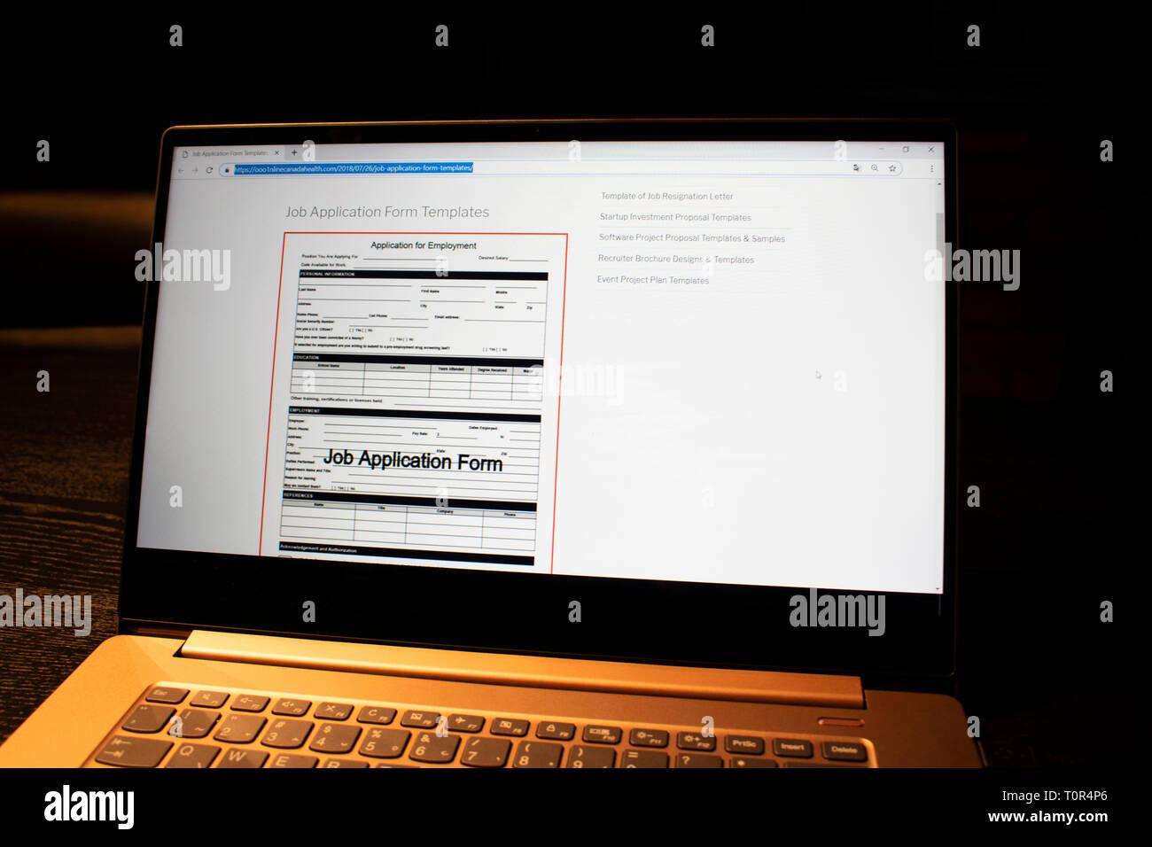 Laptop with job application form, employment Stock Photo - Alamy