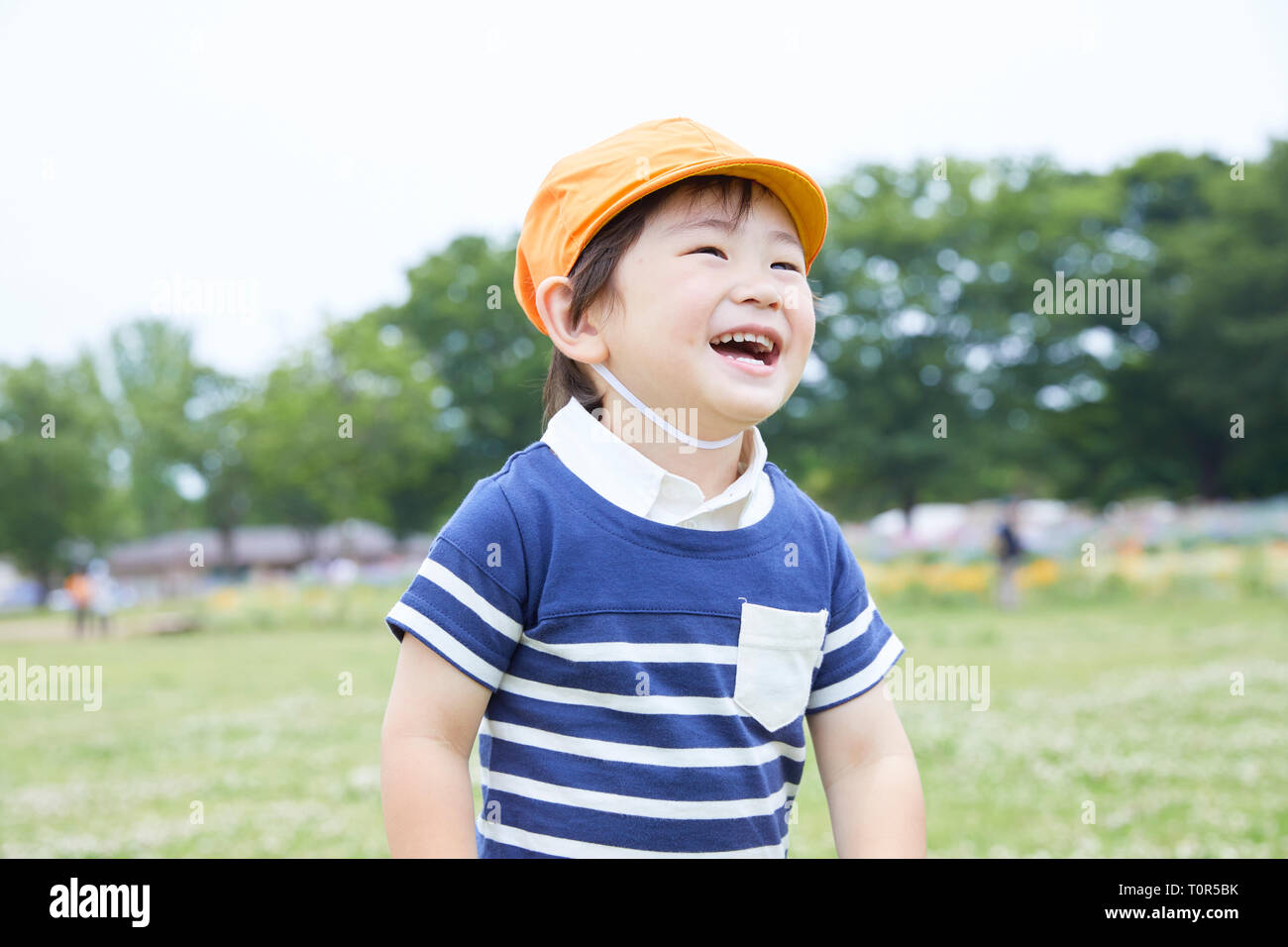 Japanese kid at a city park Stock Photo - Alamy