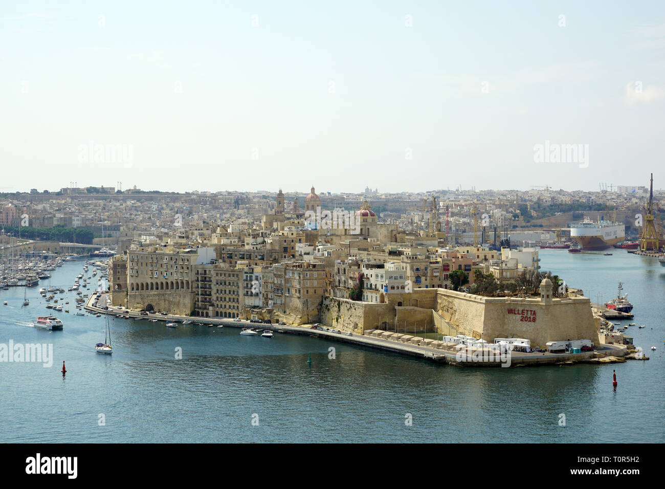 Port of Valetta in Malta with yachts and historic buildings Stock Photo ...
