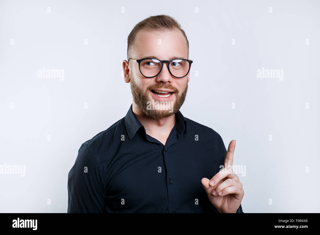 Young leader in eyeglasses hi-res stock photography and images - Alamy