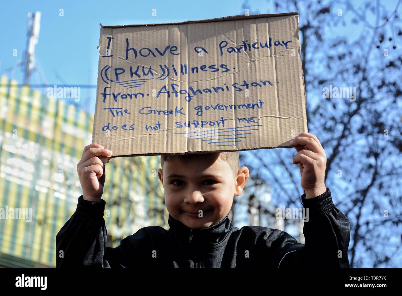 A boy seen holding a placard during the Anti-discrimination Walk 2019 ...