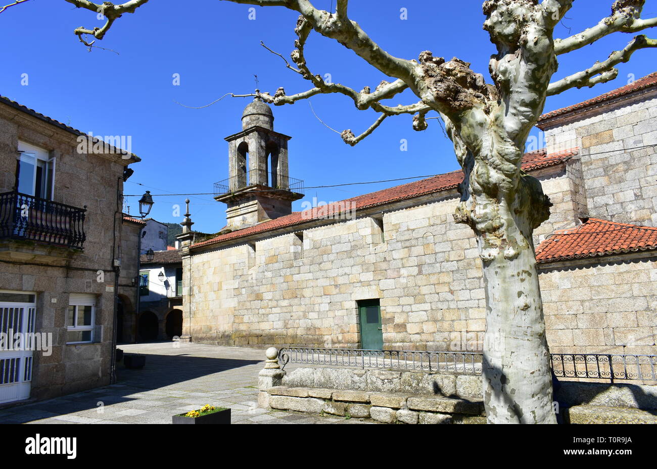 Santa Maria Magdalena medieval church, side view with baroque tower and ...