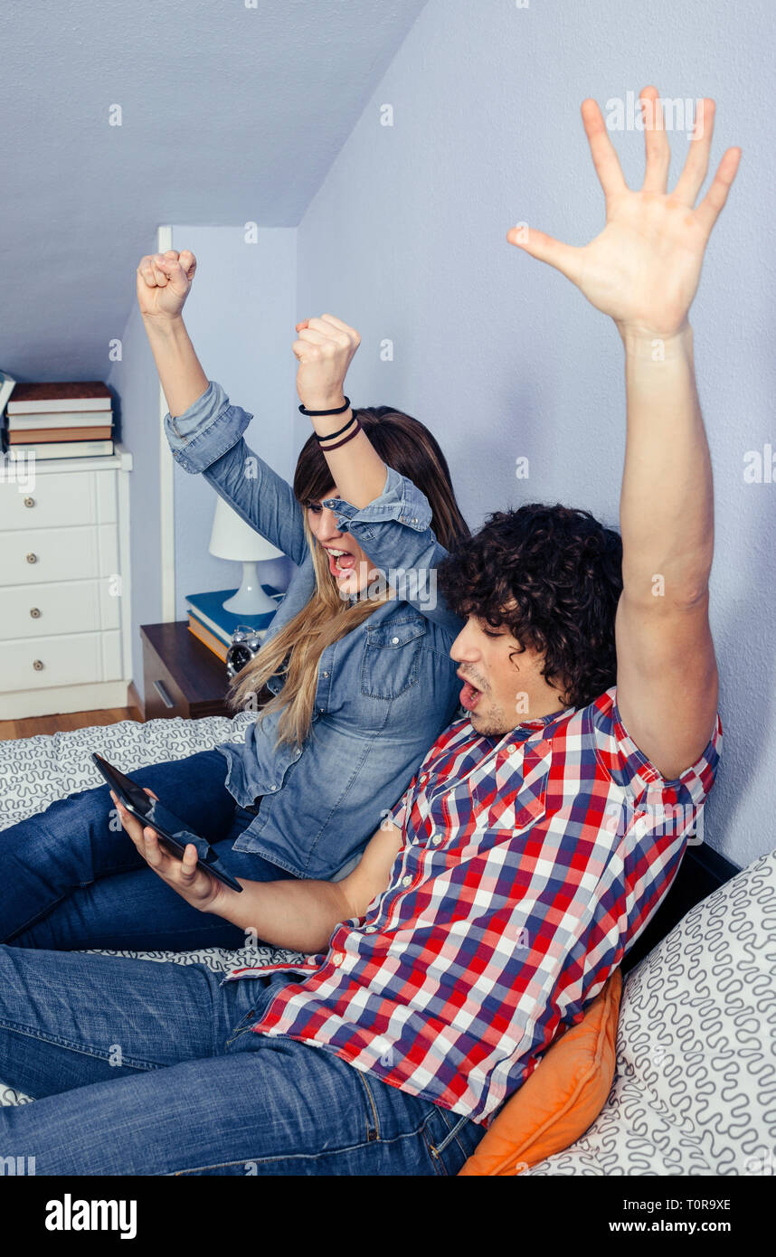 Celebrating victory hi-res stock photography and images - Alamy