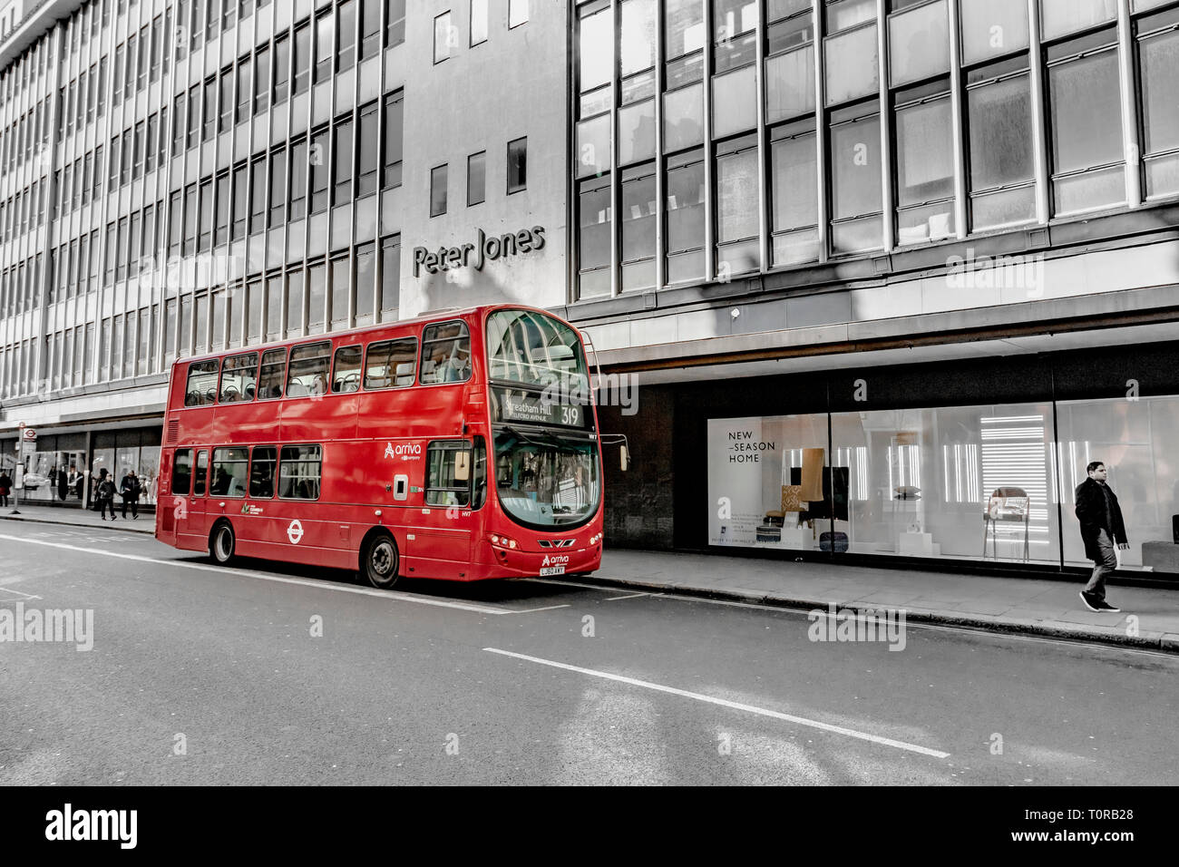A number 319 London double decker bus on The Kings Road at a bus stop ...