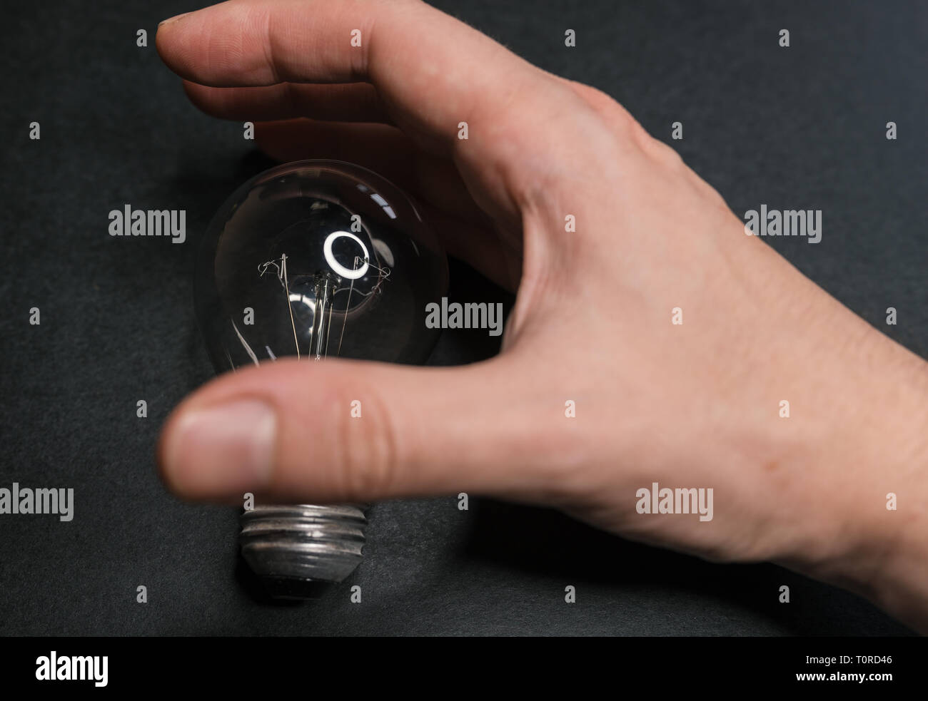 Hands on glowing globe hi-res stock photography and images - Alamy