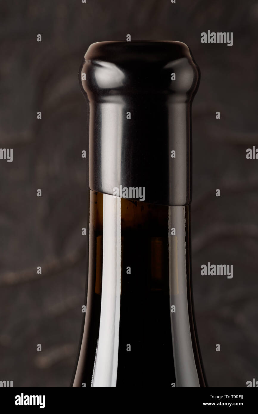 Neck of wine bottle sealed with wax Stock Photo - Alamy