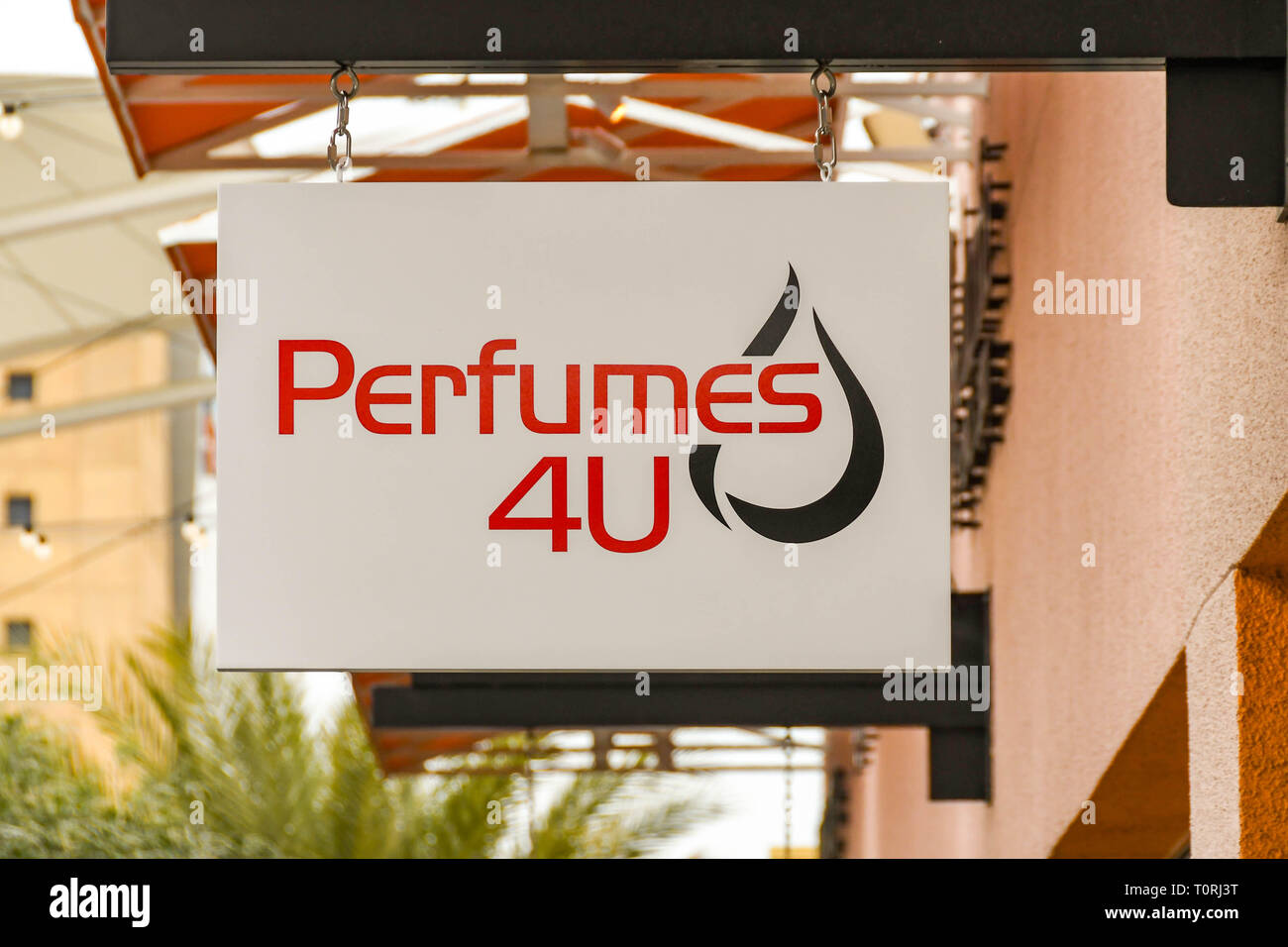 LAS VEGAS, NV, USA - FEBRUARY 2019: Sign above the entrance to the Perfumes 4U store in the ...
