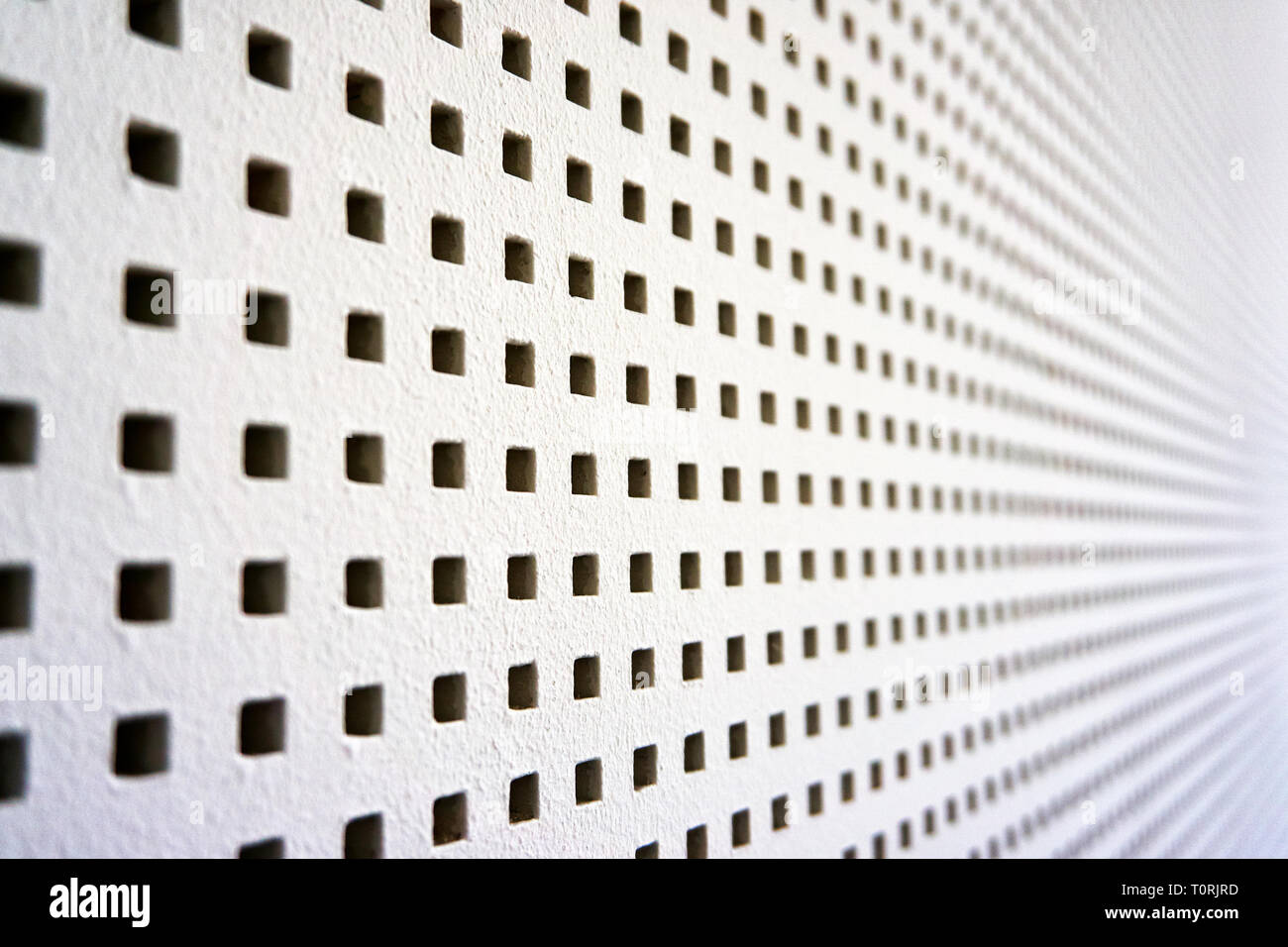 square perforated sound barrier Stock Photo - Alamy