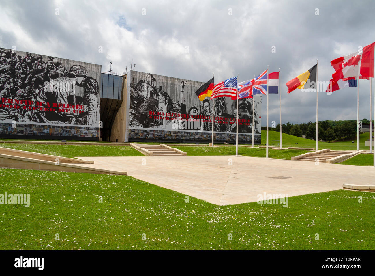 Flags flying outside the Mémorial de Caen (Caen Memorial), Normandy ...