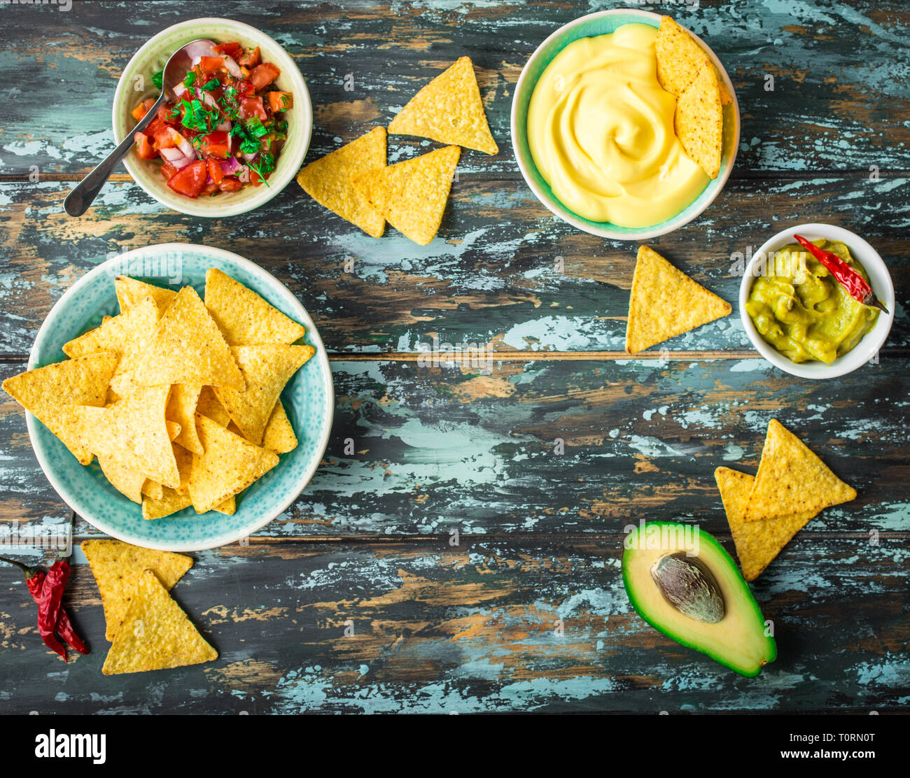 Tortilla chips and assorted dips Stock Photo - Alamy