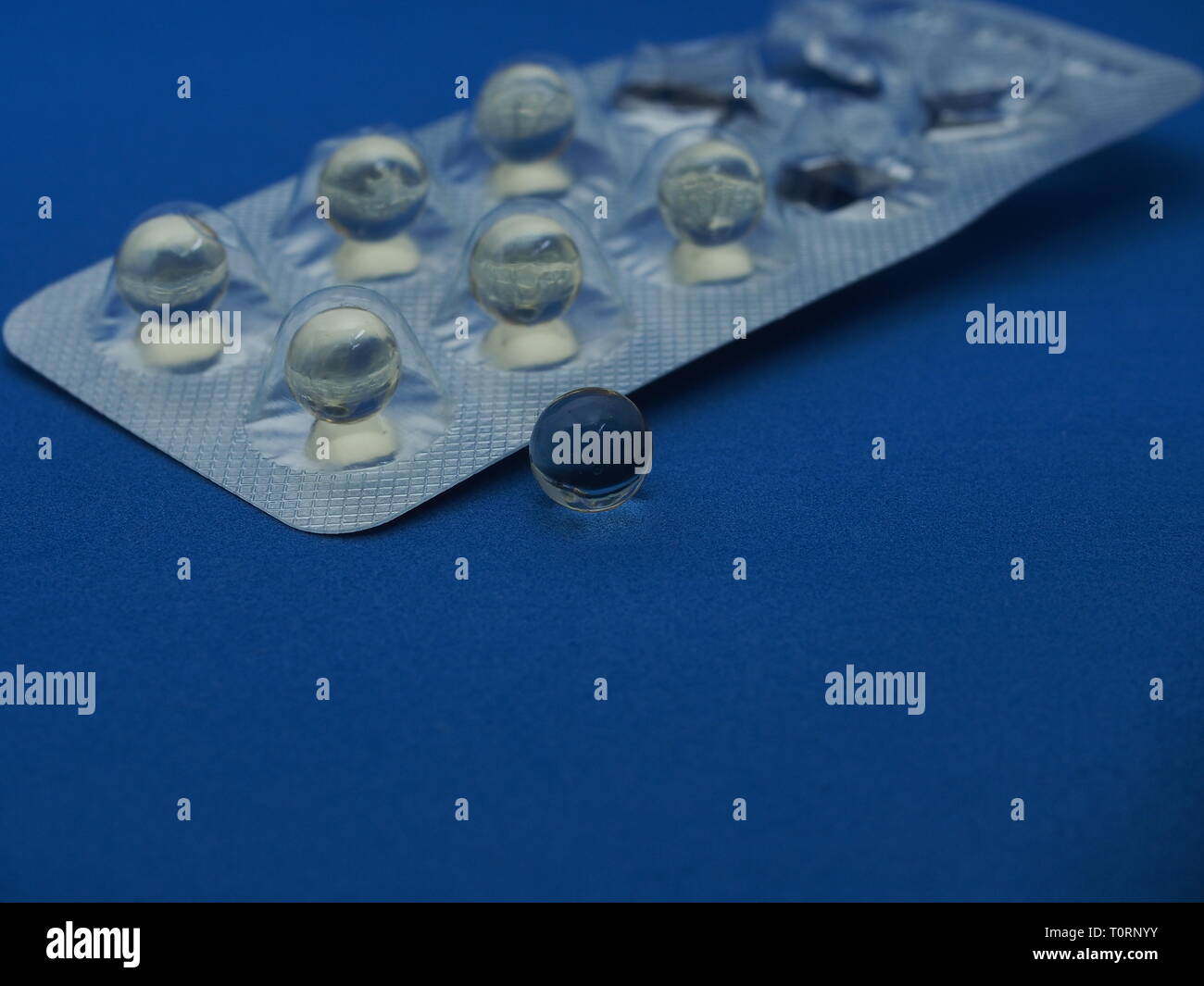 The drug is in a transparent capsule. Transparent plastic packaging ...