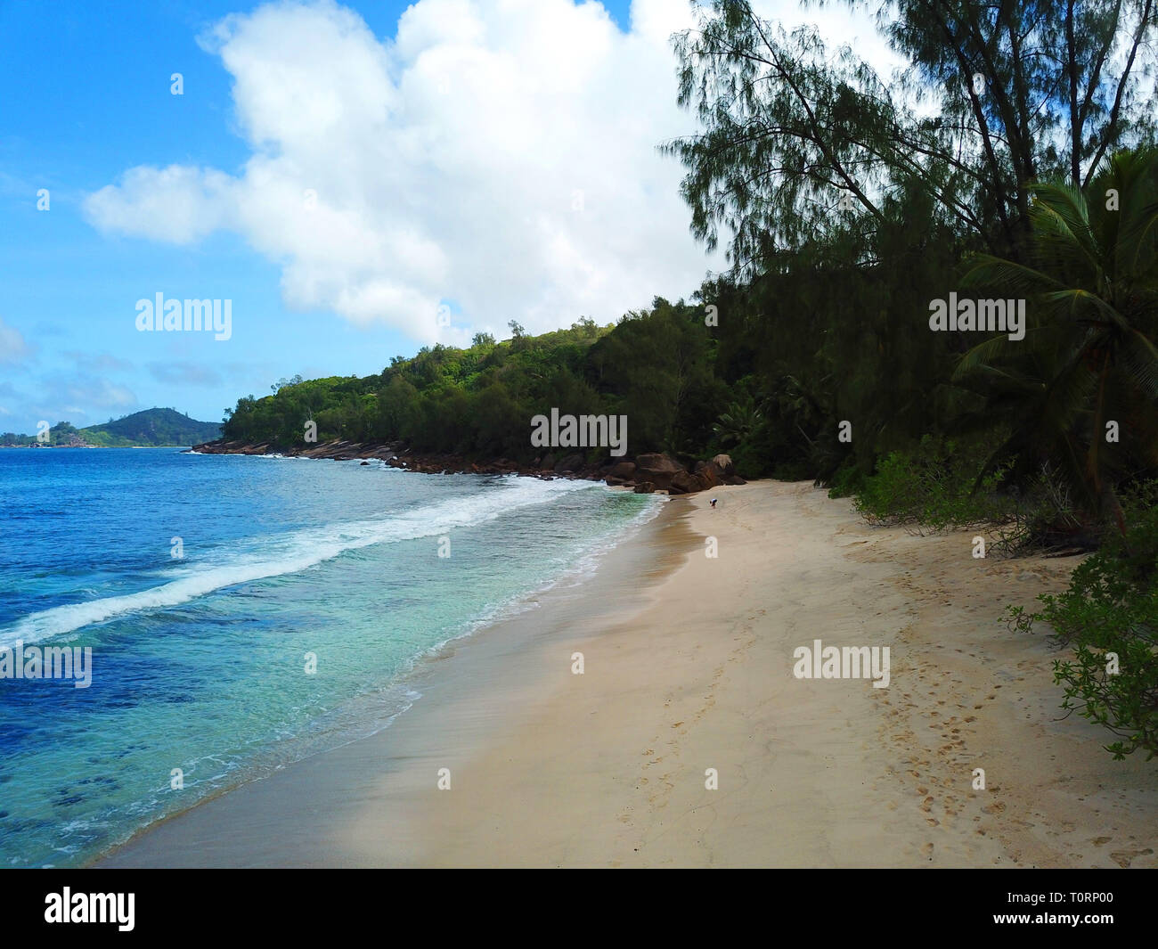 The Indian Ocean with coral reef on Seychelles island Mahe Stock Photo ...