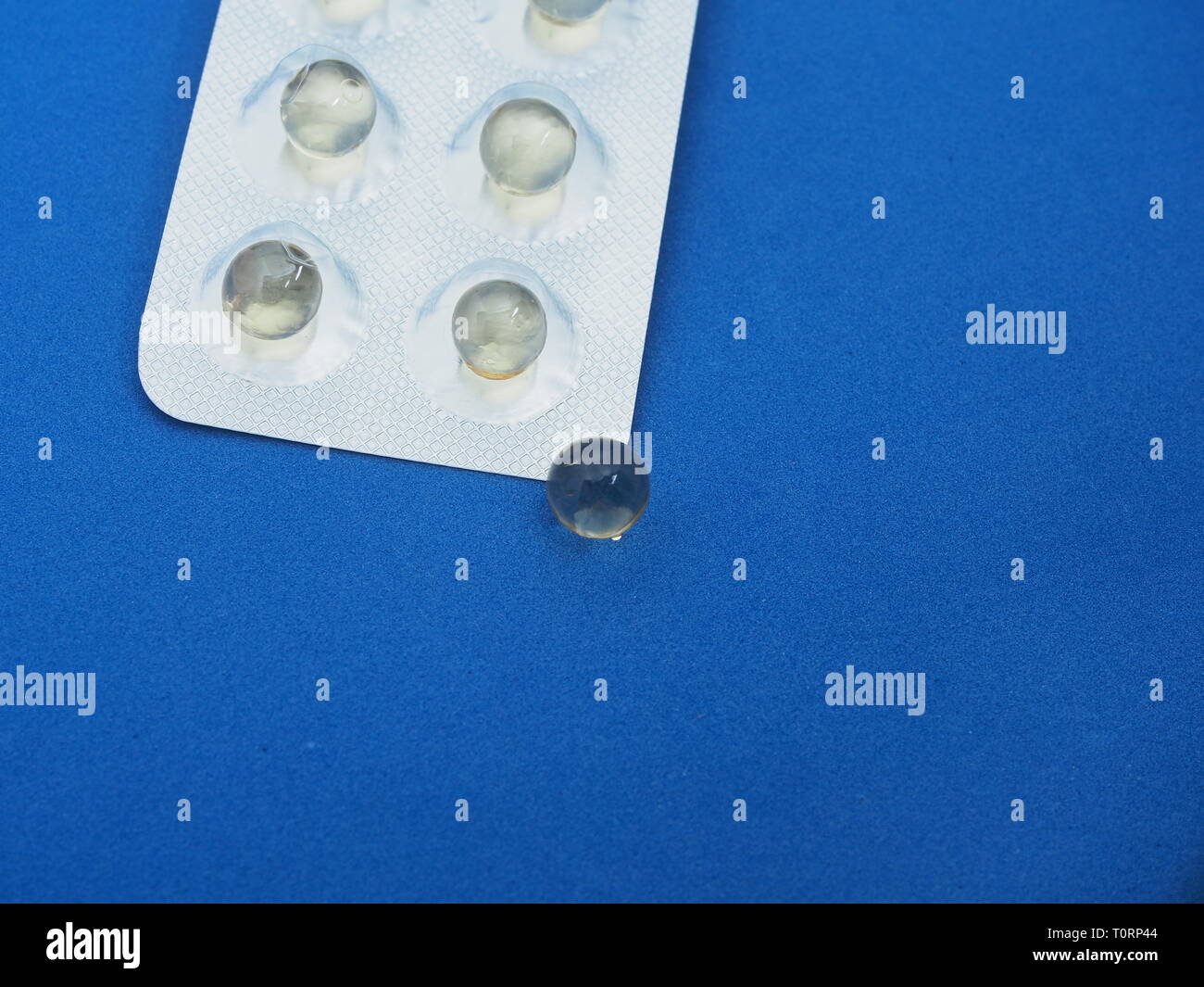 The drug is in a transparent capsule. Transparent plastic packaging ...