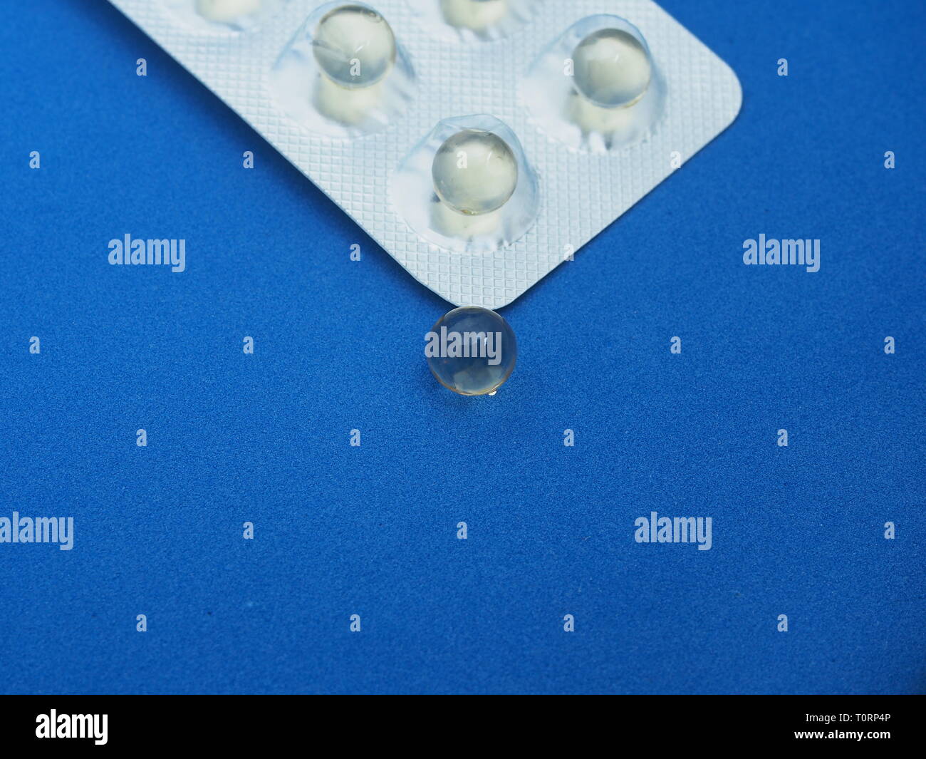The drug is in a transparent capsule. Transparent plastic packaging ...