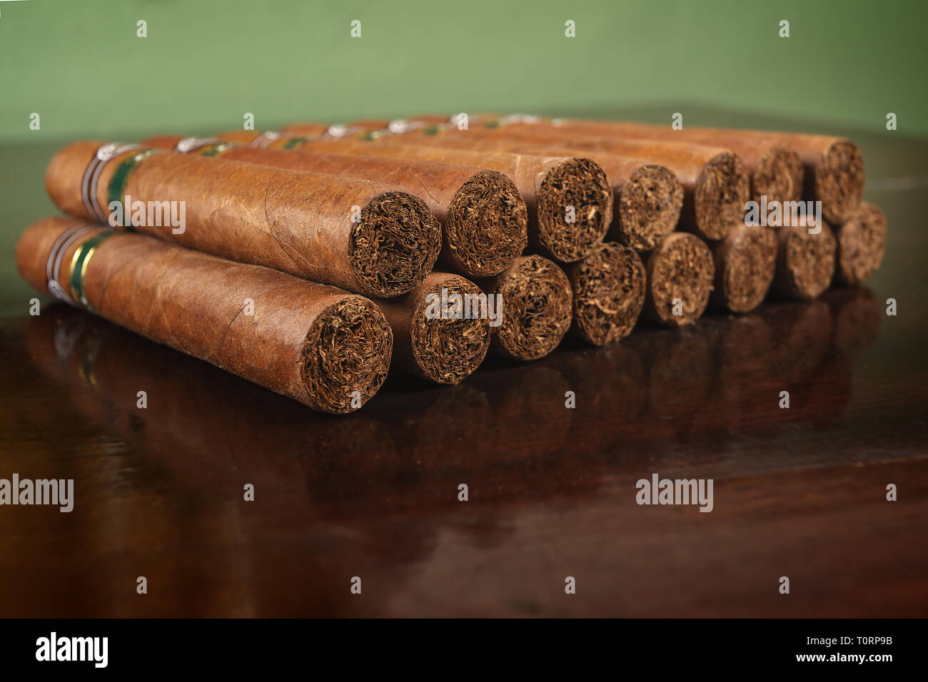 Cuban cigar on table hi-res stock photography and images - Alamy