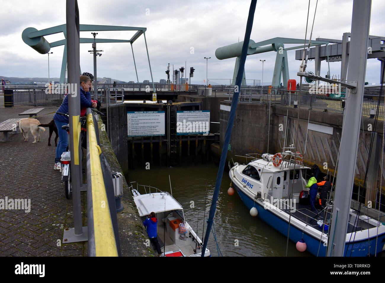 Boats entering the Cardiff Bay barrage lock, Cardiff Bay, South ...