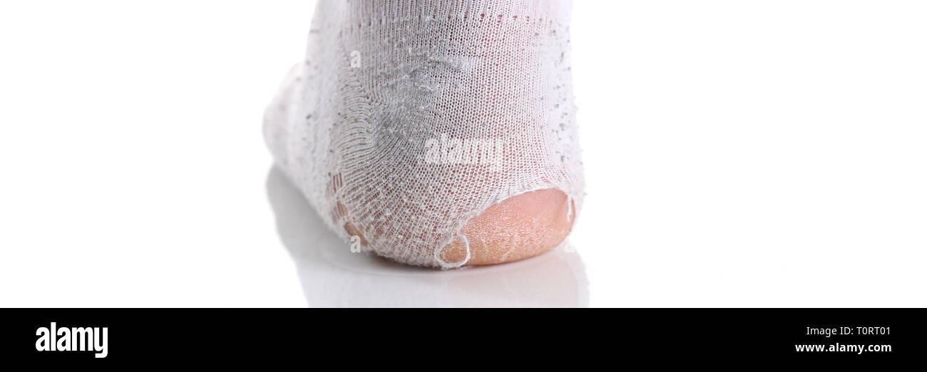 Ripped white sock on male leg isolated Stock Photo - Alamy