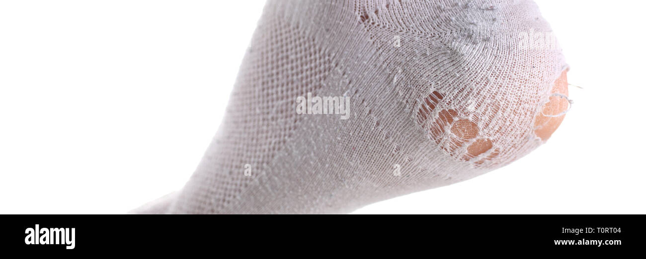 Ripped white sock on male leg isolated Stock Photo - Alamy