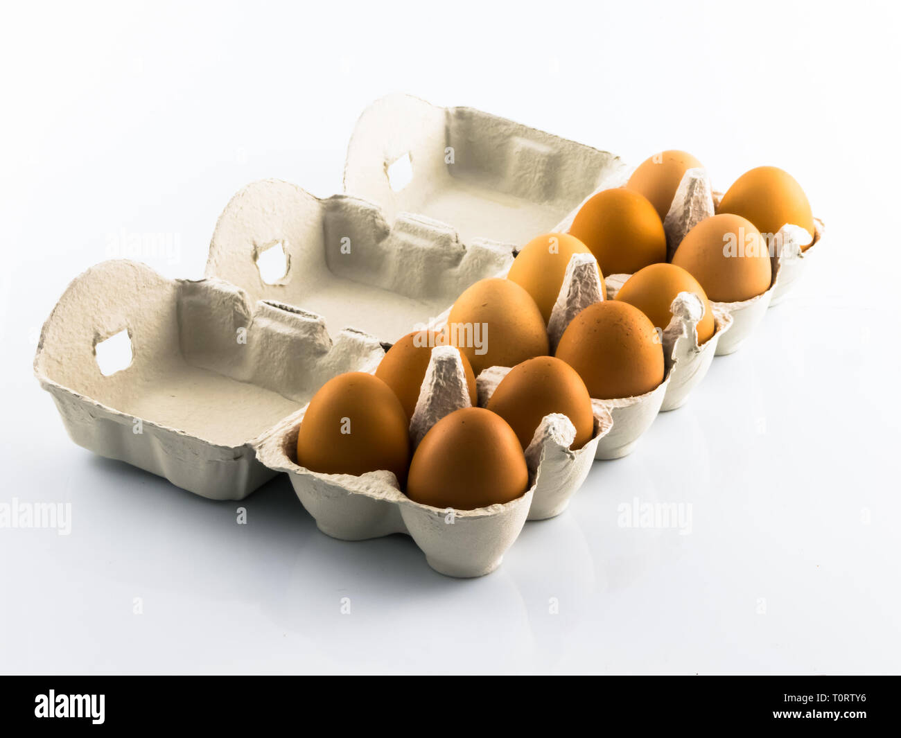 Isolated full egg carton Stock Photo - Alamy