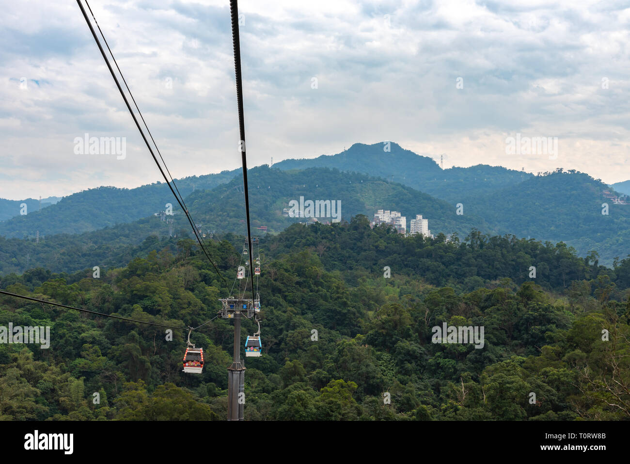 Maokong gondola with mountain around. A gondola lift transportation ...