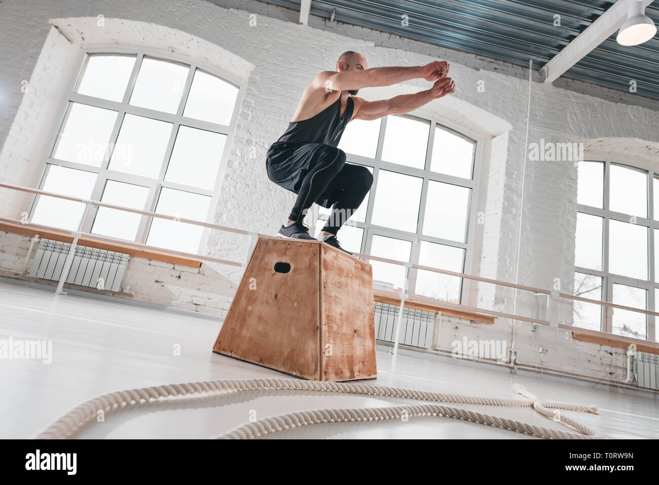 Squat jump box man hi-res stock photography and images - Alamy