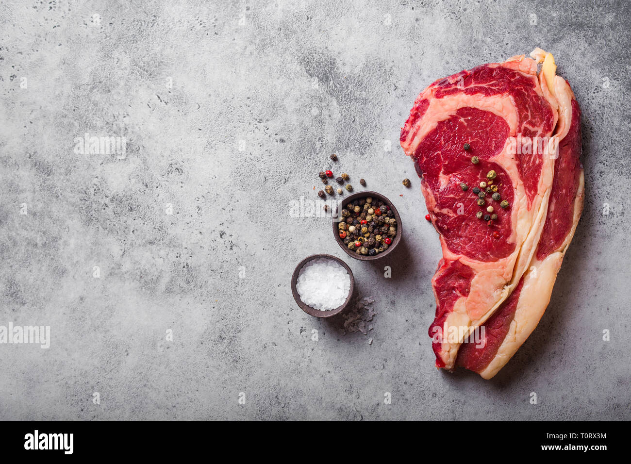 Raw marbled beef Rib eye steak Stock Photo - Alamy