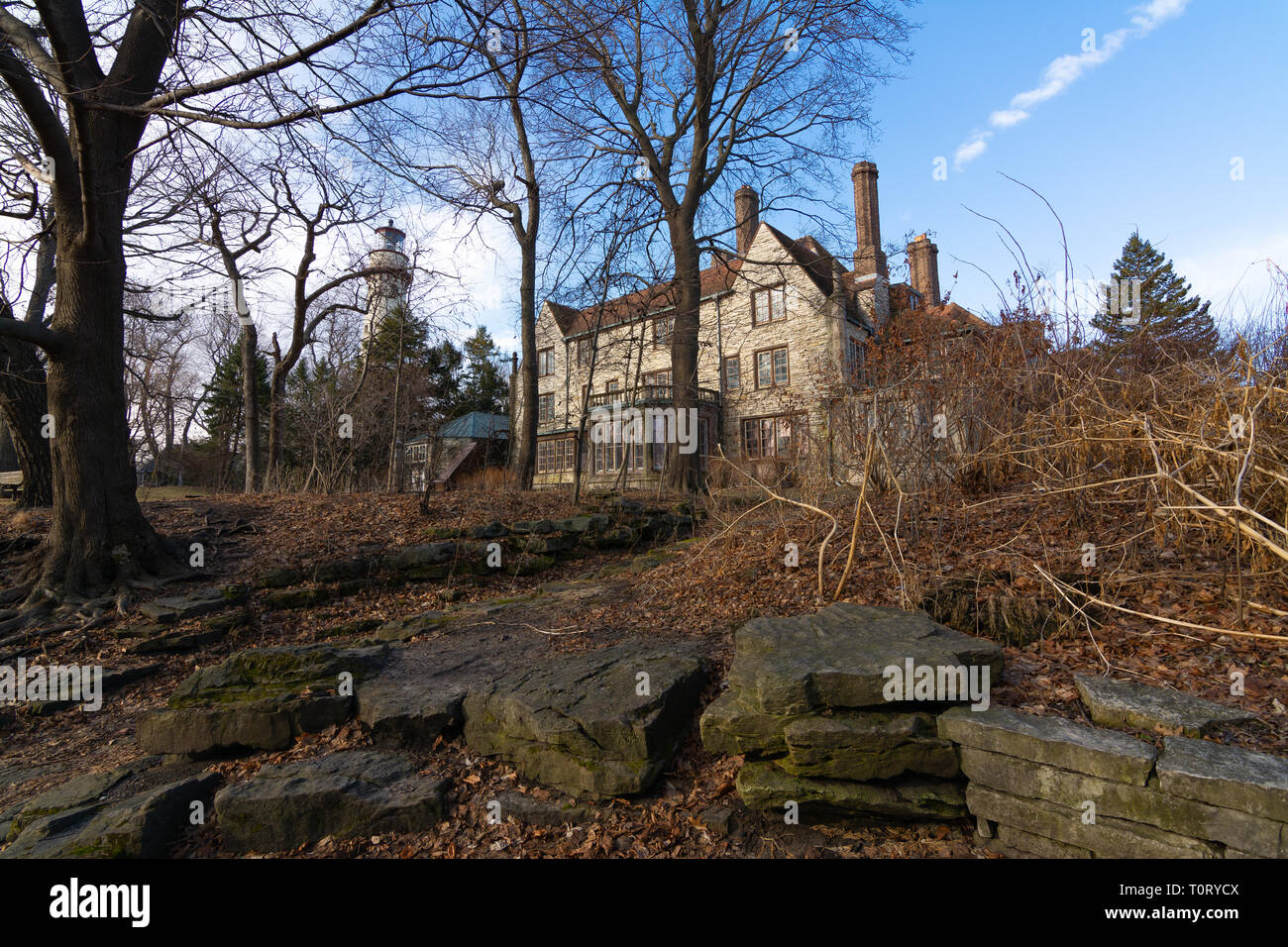Stone path leading to old lighthouse and building Stock Photo - Alamy