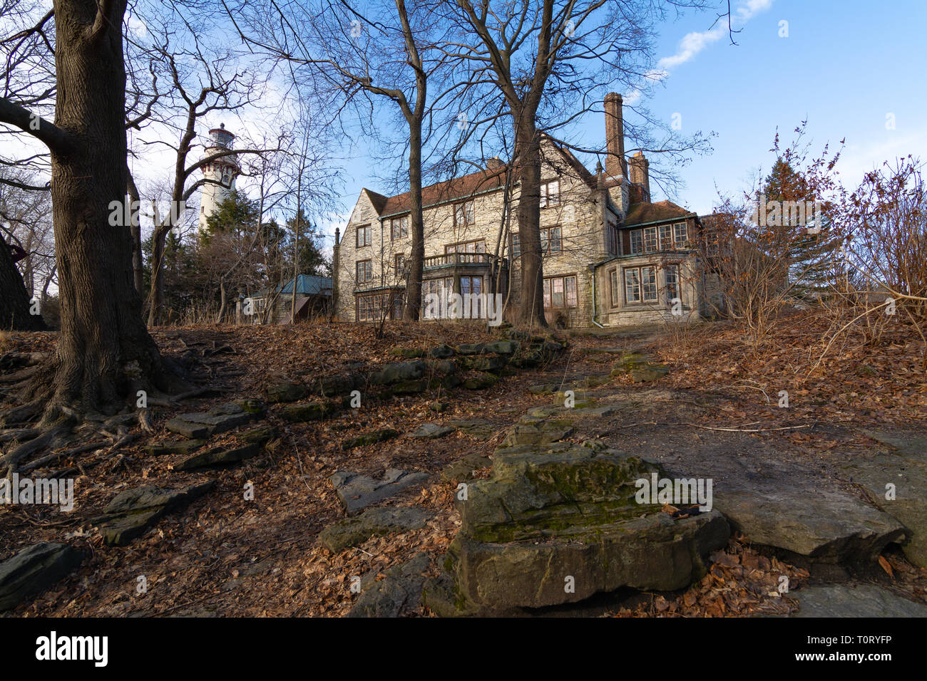 Stone path leading to old lighthouse and building Stock Photo - Alamy