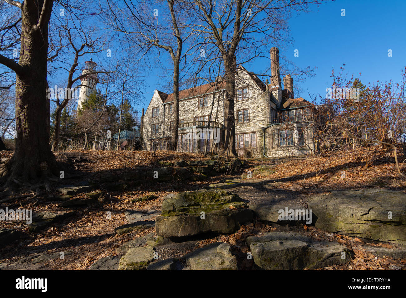 Stone path leading to old lighthouse and building Stock Photo - Alamy