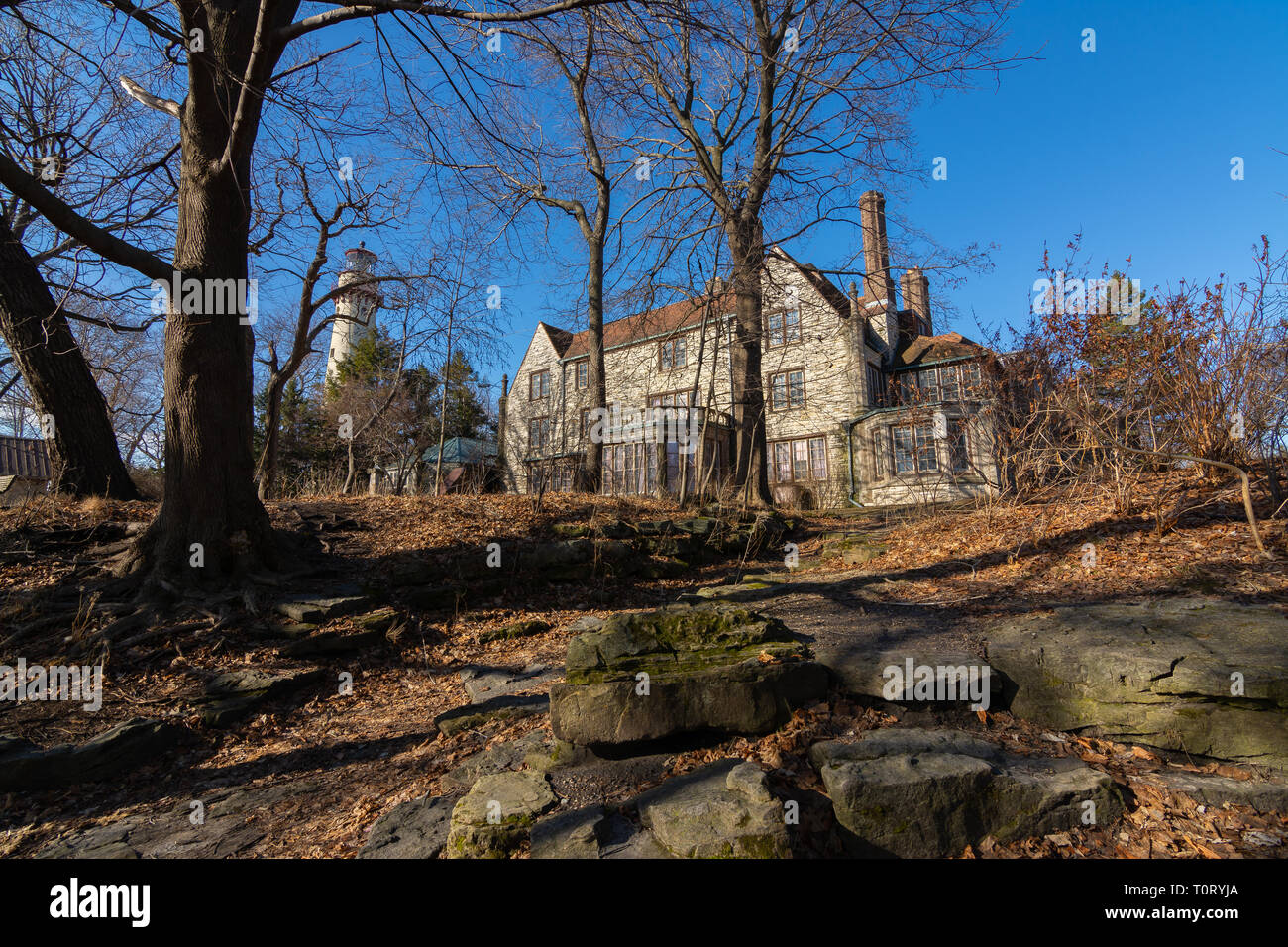 Stone path leading to old lighthouse and building Stock Photo - Alamy