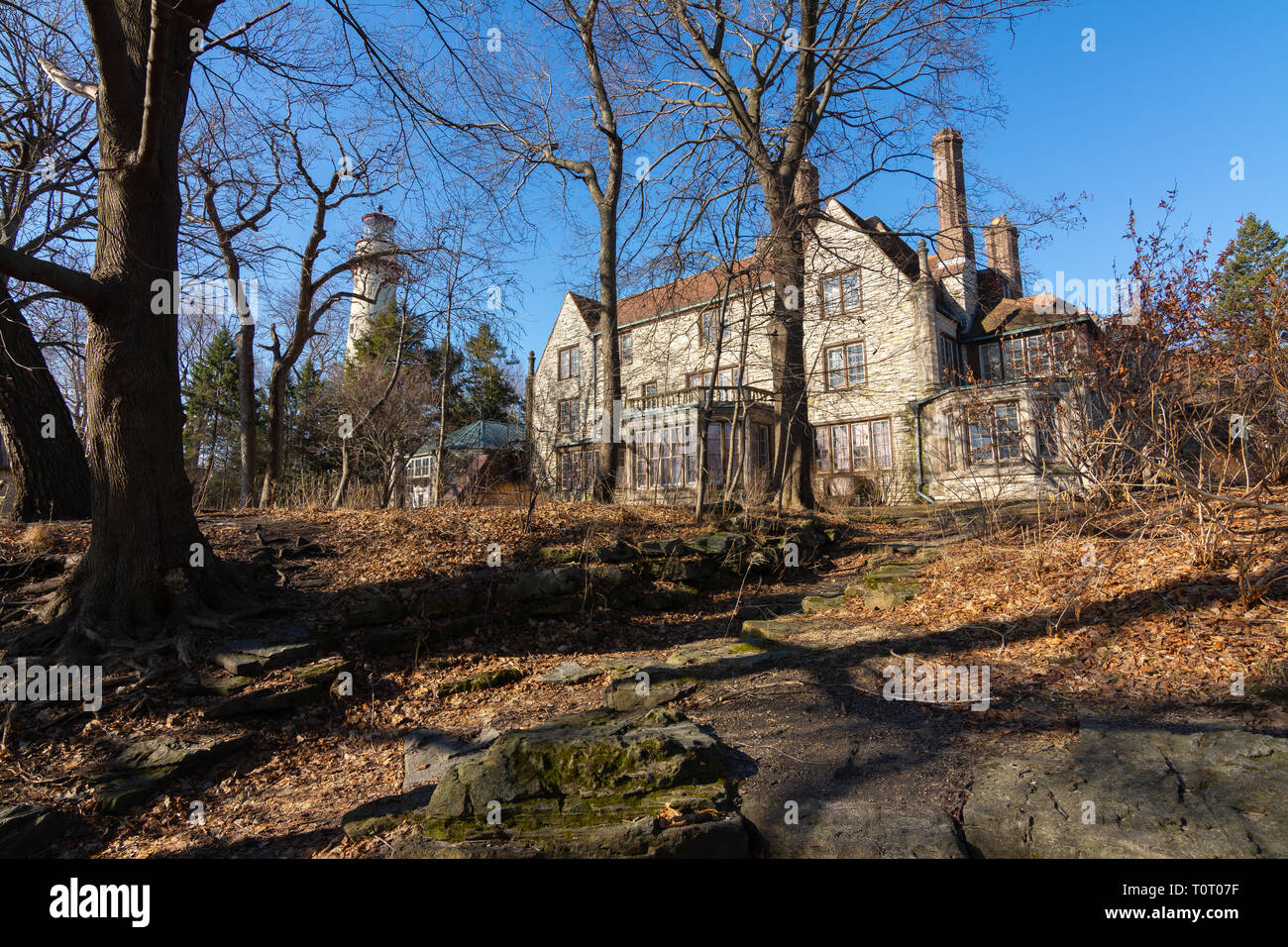 Stone path leading to old lighthouse and building Stock Photo - Alamy