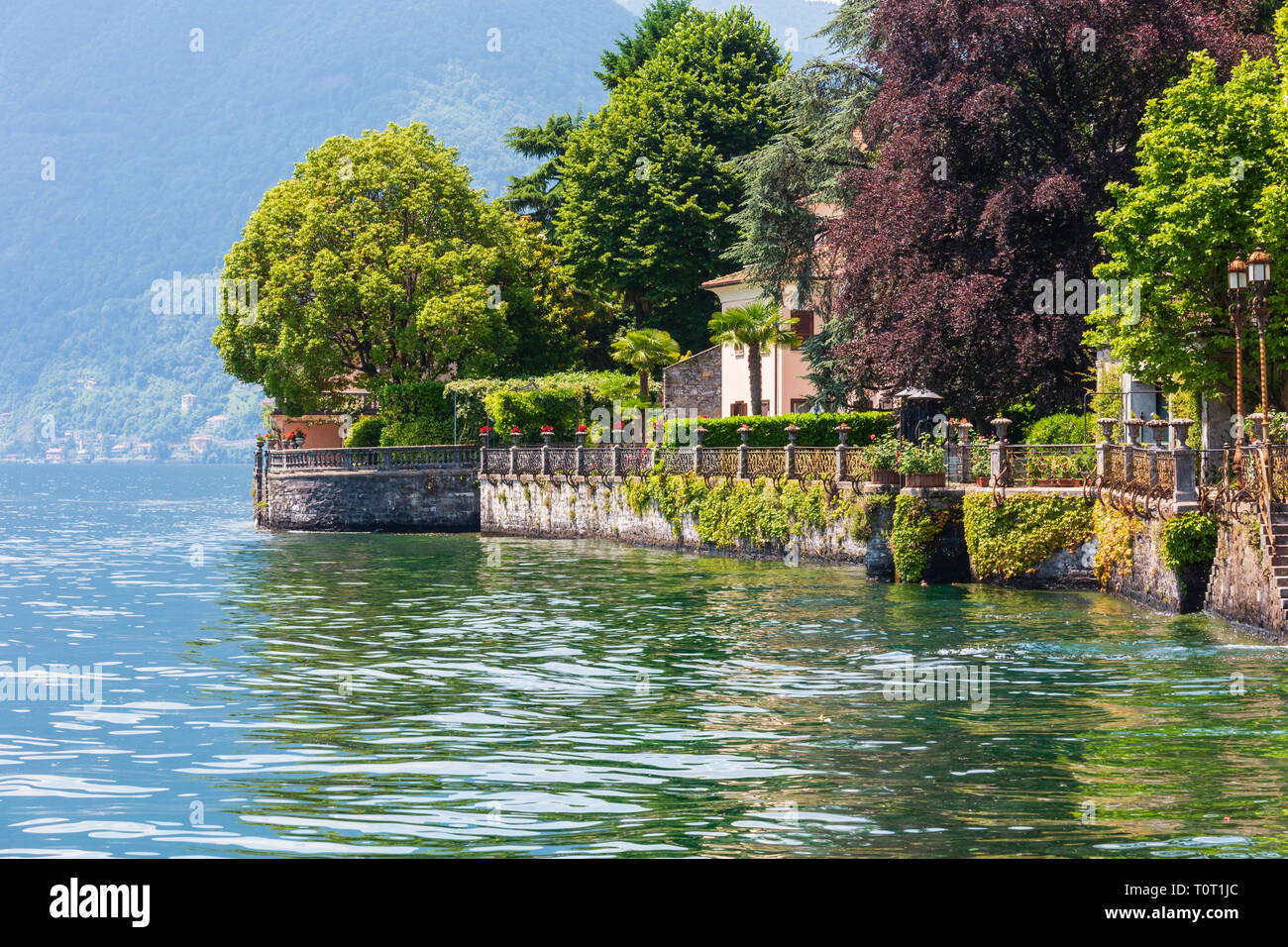 Lake Como, Italy - June 15, 2012: Summer lake shore view from ship ...