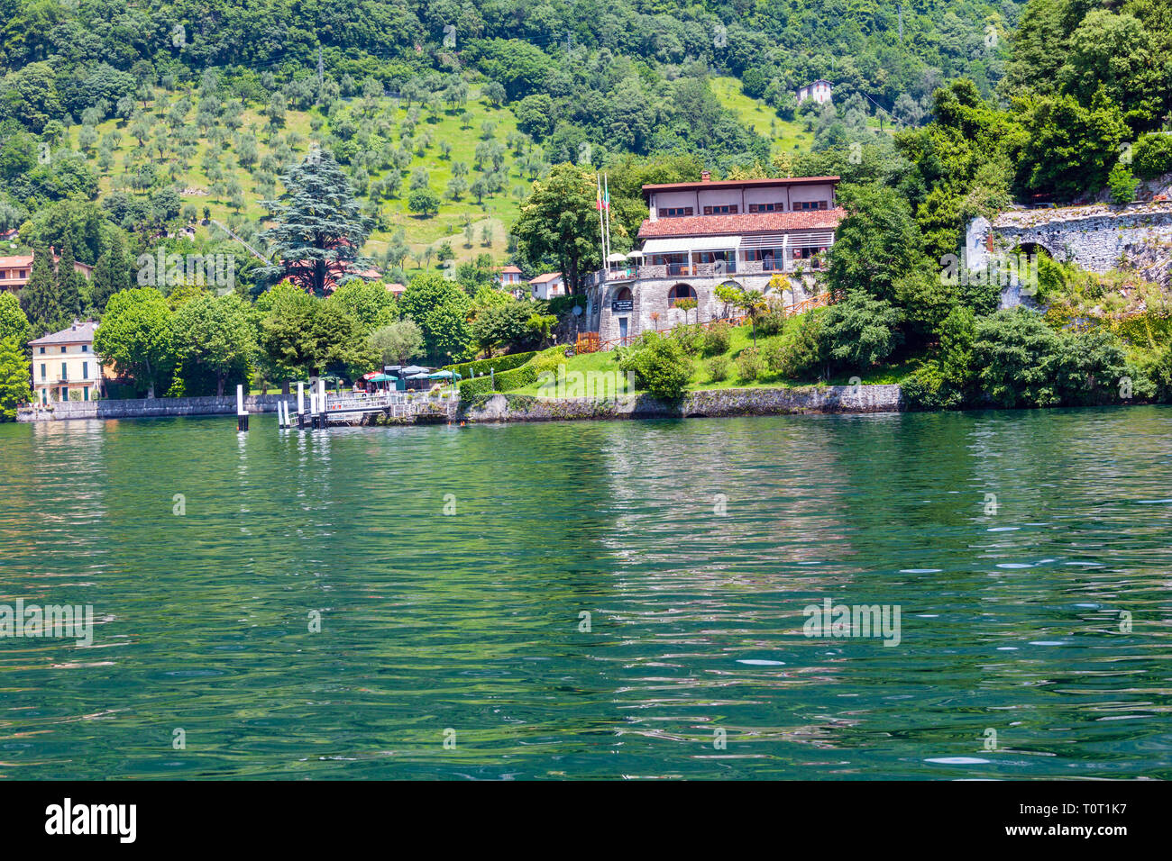 Lake Como, Italy - June 15, 2012: Summer lake shore view from ship ...