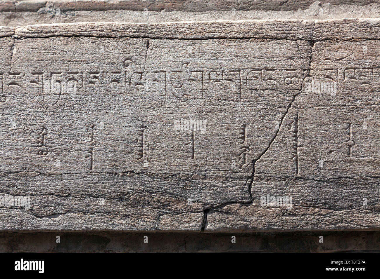 Antique letters and signs engraved in the stone walls at Five Pagoda ...