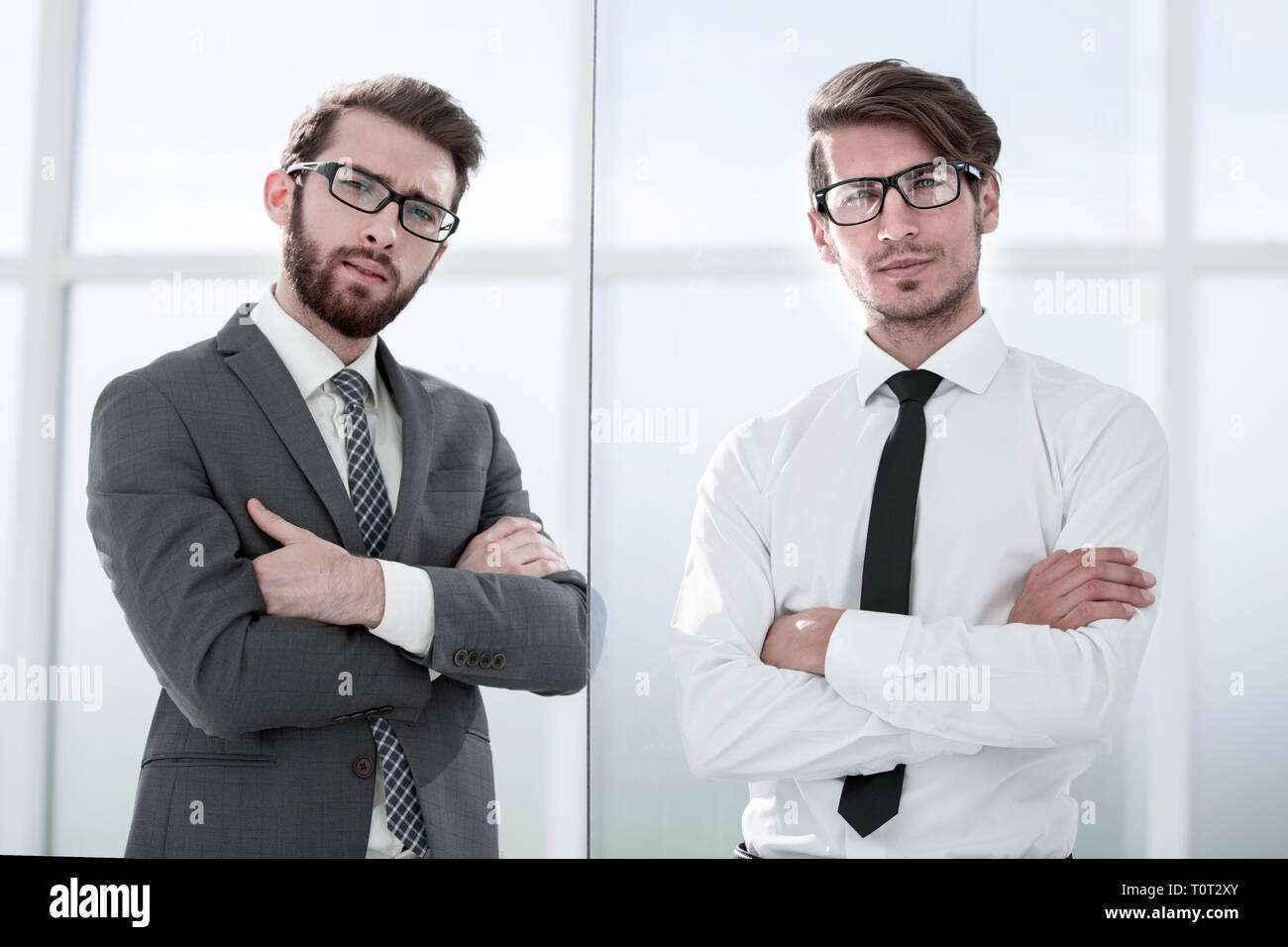 Office door two men hi-res stock photography and images - Alamy
