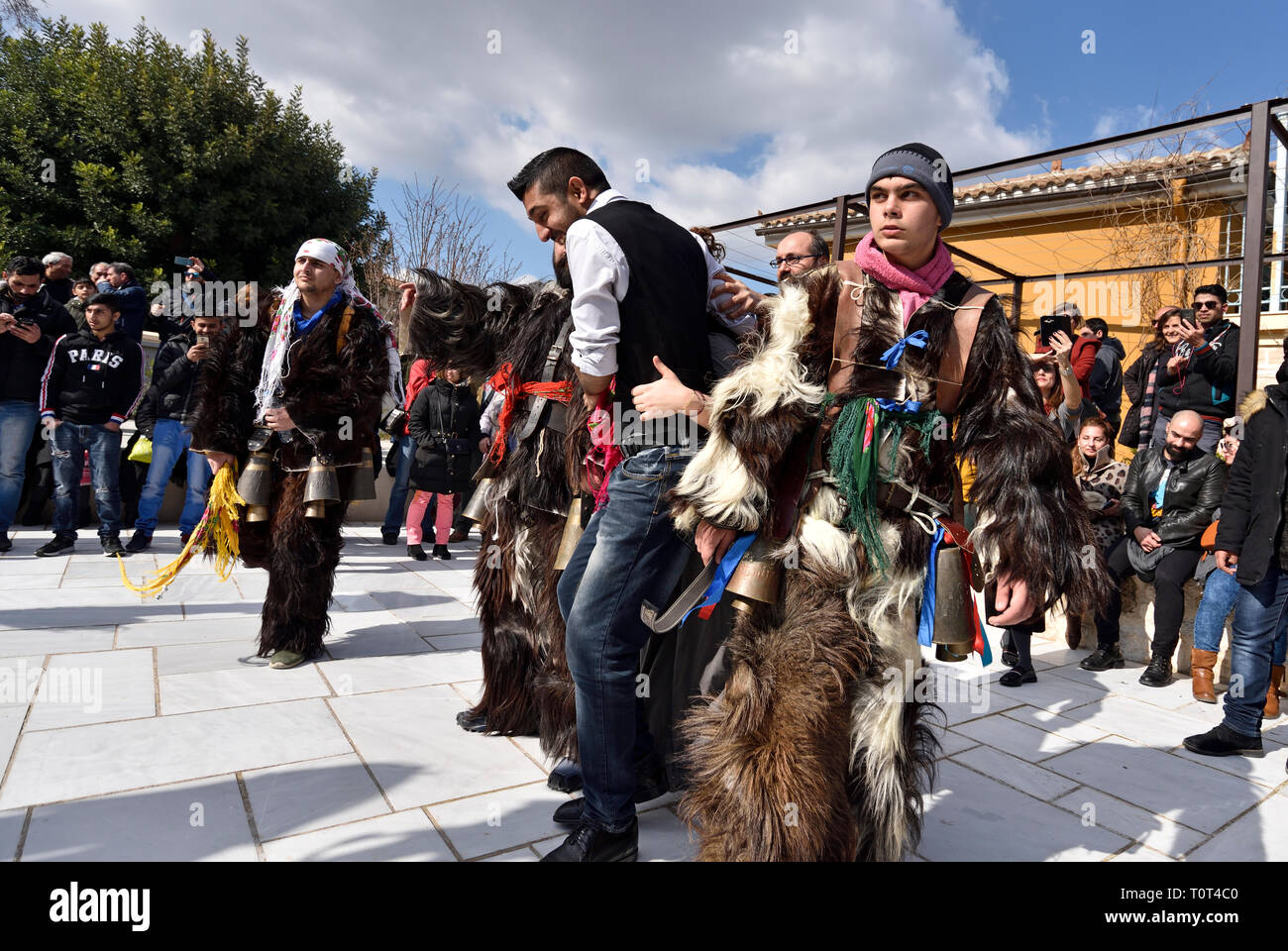 Men from Northern Greece wearing traditional costumes with bells, dance ...