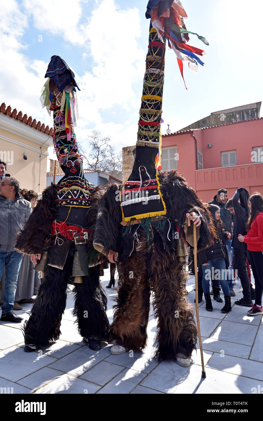 Men from Northern Greece wearing traditional costumes with bells, pose ...