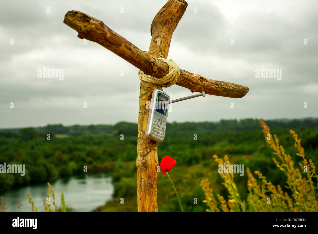 cellphone on wooden cross Stock Photo - Alamy
