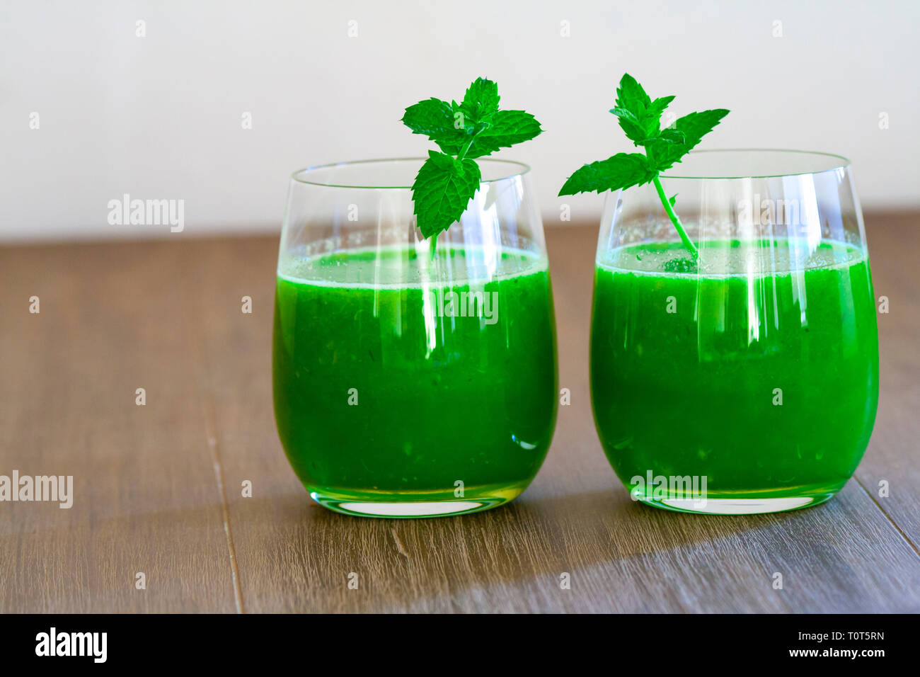 healthy wheat grass juice Stock Photo - Alamy