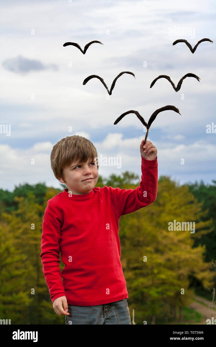 kid painting birds Stock Photo - Alamy
