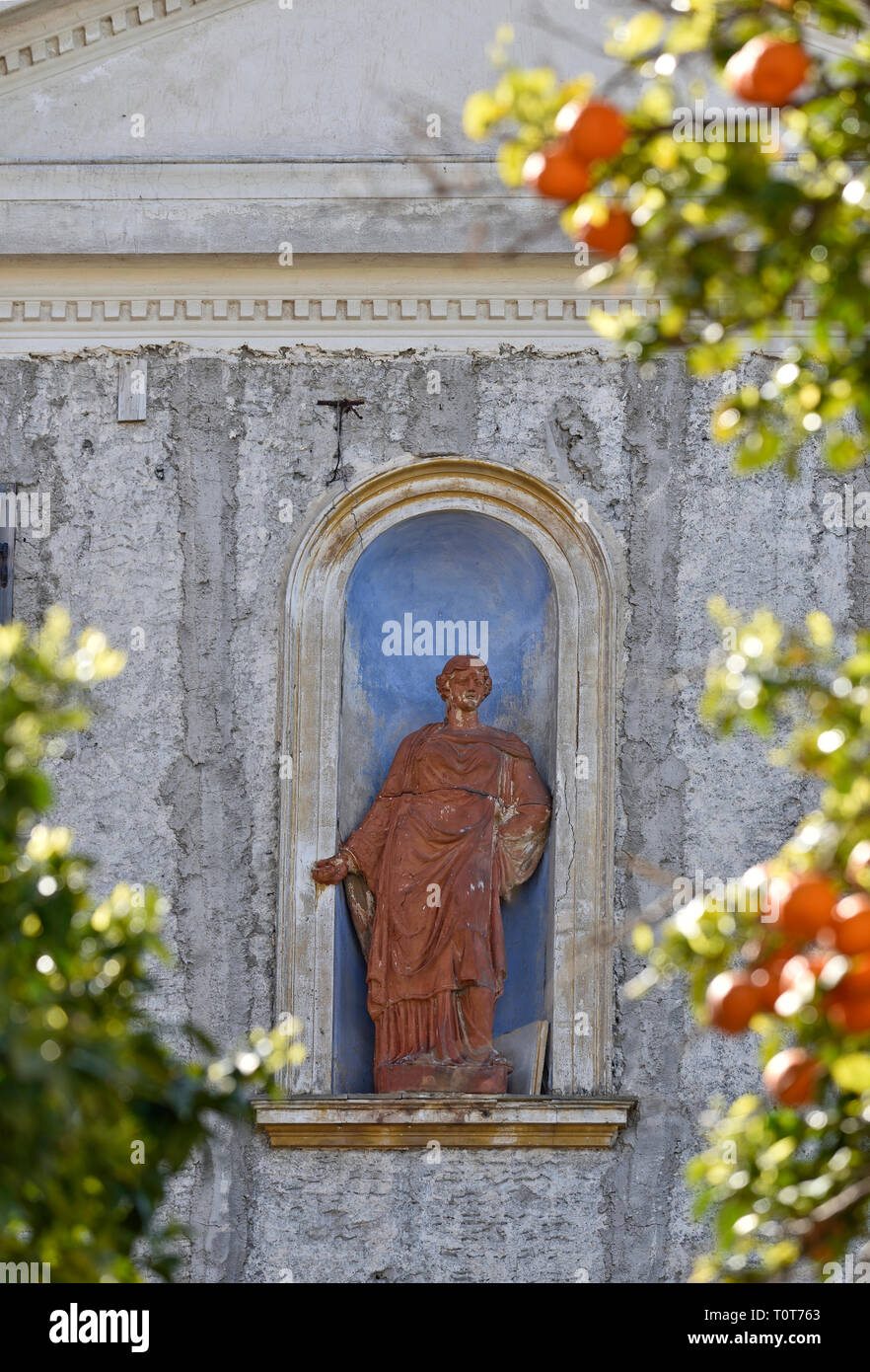 Statue in a wall recess in an old house in Plaka, Athens, Greece Stock ...