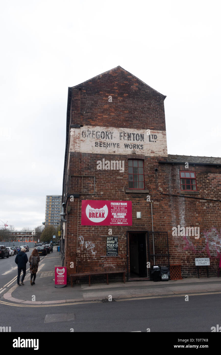 Old refurbished factory building used as a trendy cafe Stock Photo - Alamy