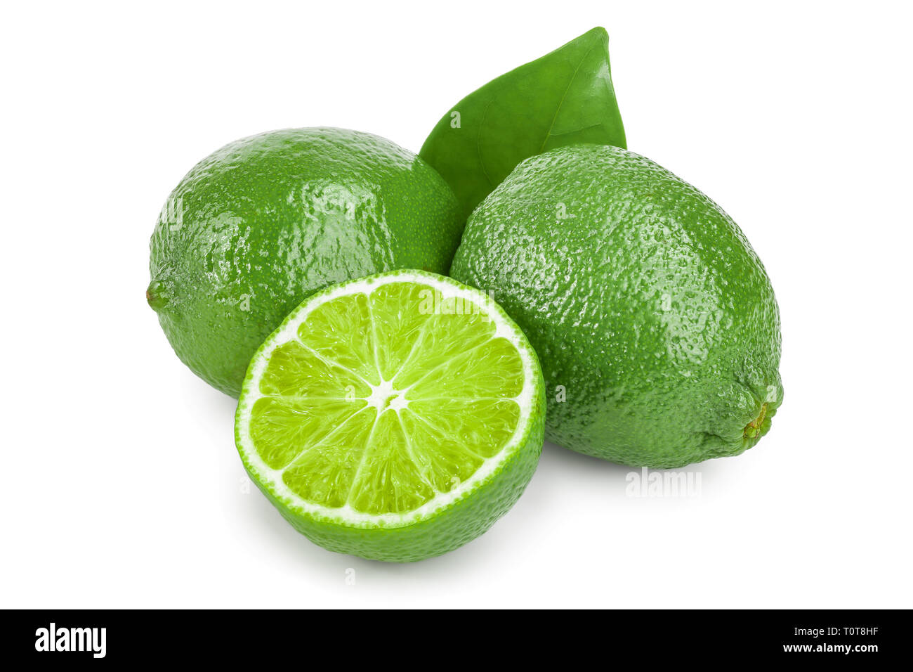 lime with half and leaf isolated on white background Stock Photo - Alamy