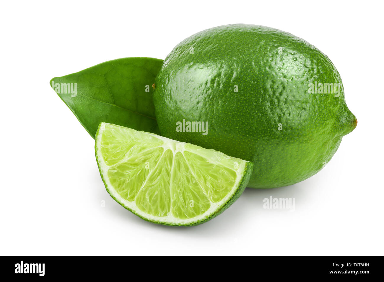 lime with slice and leaf isolated on white background Stock Photo - Alamy