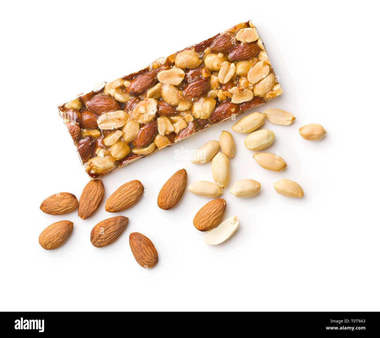 Sweet nut bar with honey, almonds and peanuts isolated on white ...