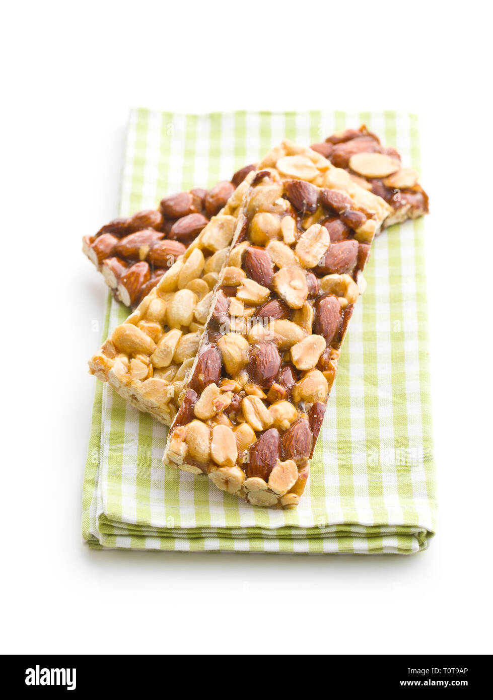 Sweet nut bars with honey isolated on white background Stock Photo - Alamy