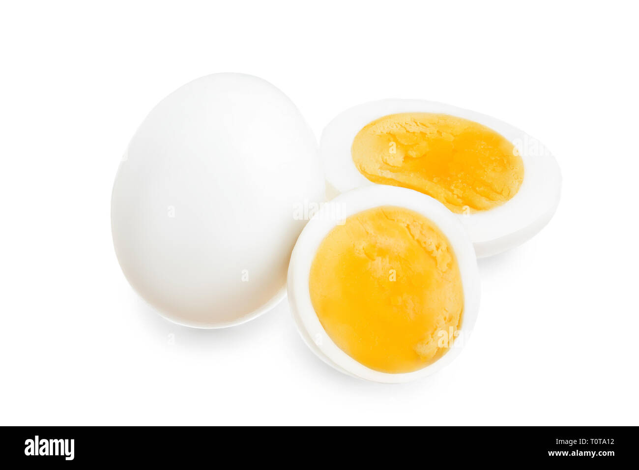 boiled egg and half isolated on white background Stock Photo - Alamy